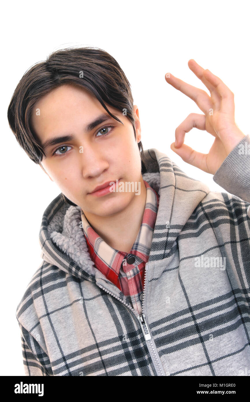 Teen shows finger gesture OK Stock Photo - Alamy