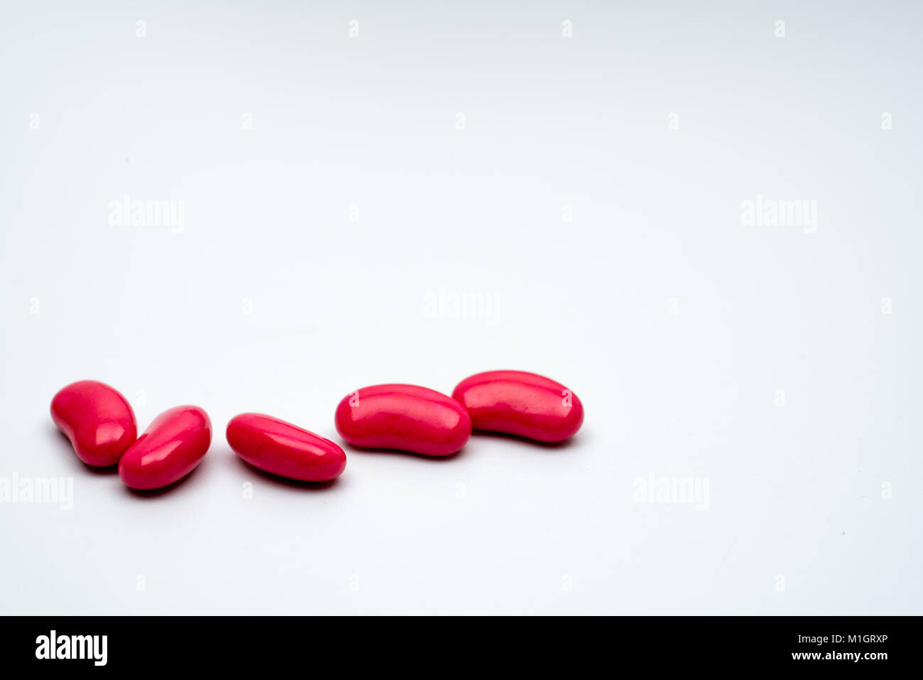 Vitamin tablets color red hi-res stock photography and images - Alamy
