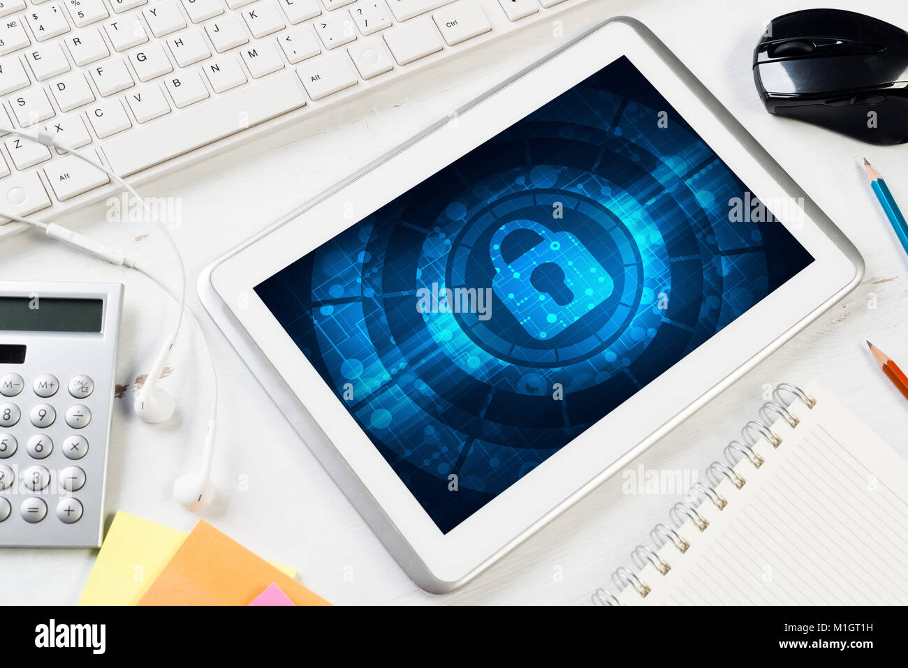 Web security and technology concept with tablet pc on wooden table ...