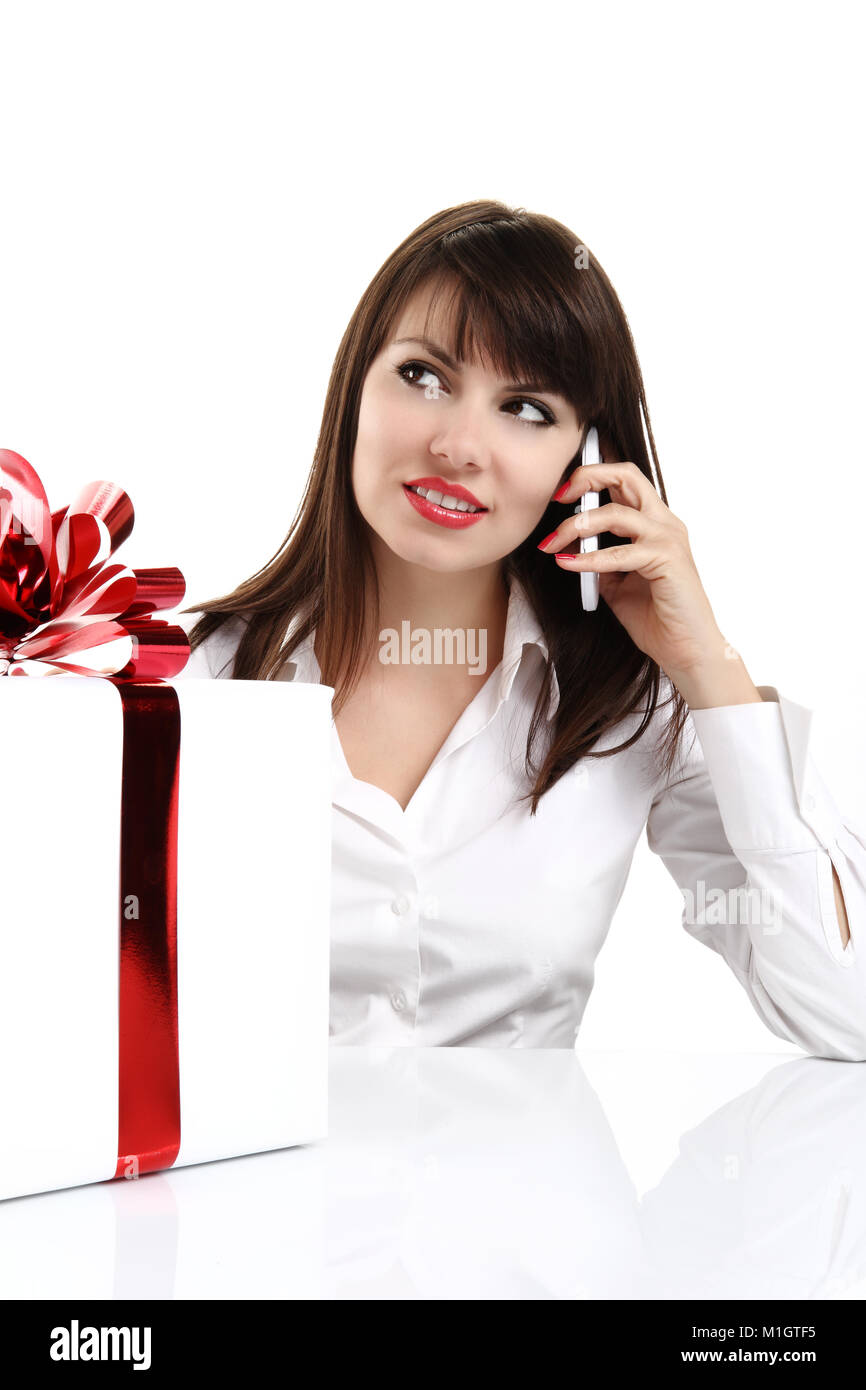 woman with phone and gift box Stock Photo - Alamy