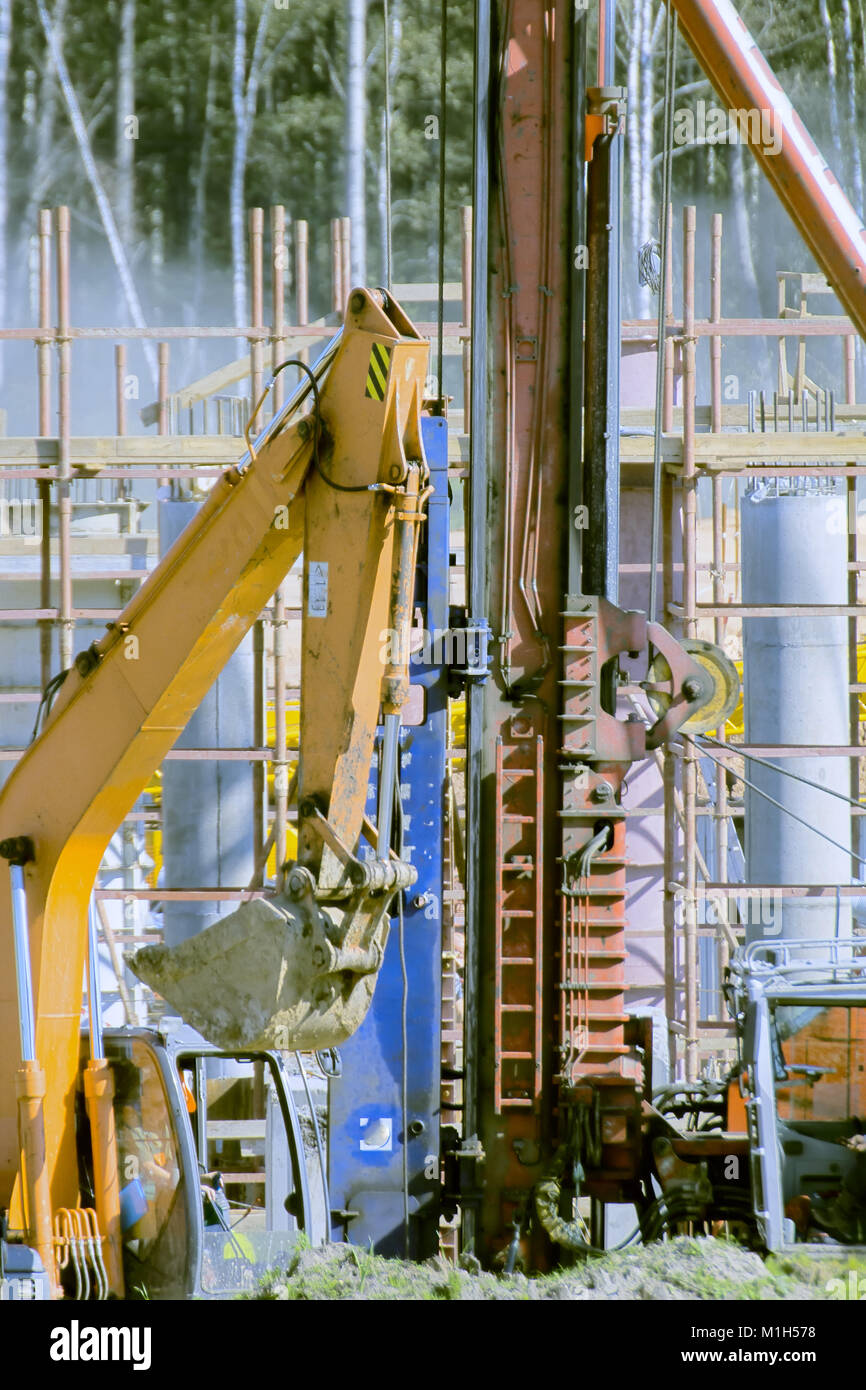 pile crane in construction site. ssembly of viaduct close up Stock ...