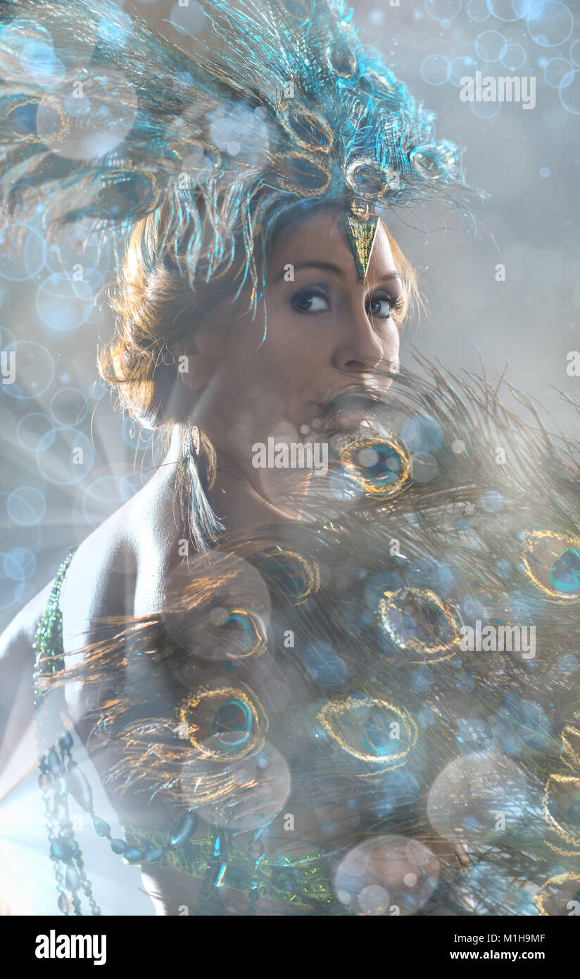 Portrait of exotic dancer wearing performance costume, tinted image ...