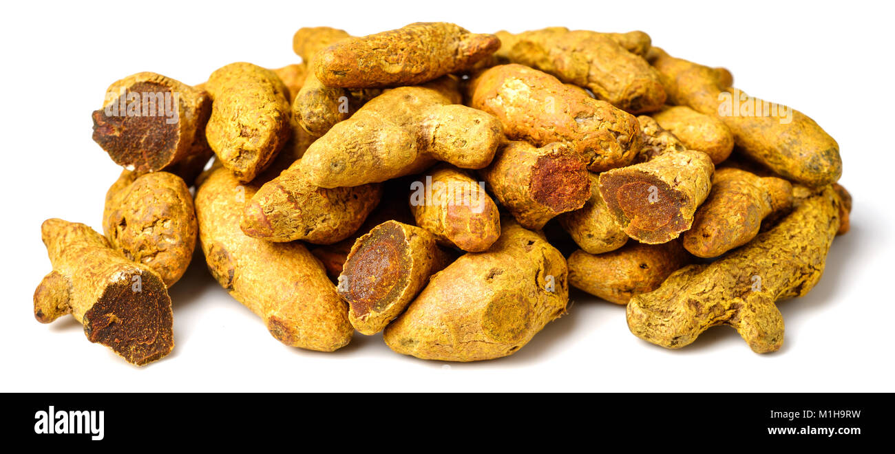 dried turmeric isolated on the white background Stock Photo - Alamy