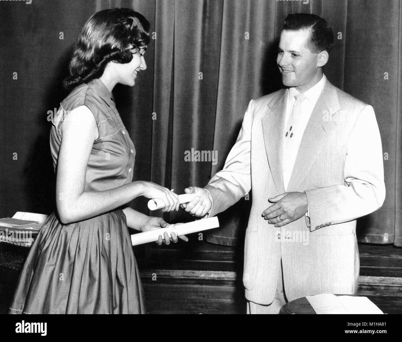 Photograph showing Dr. Max Moody presenting a certificate as an award ...