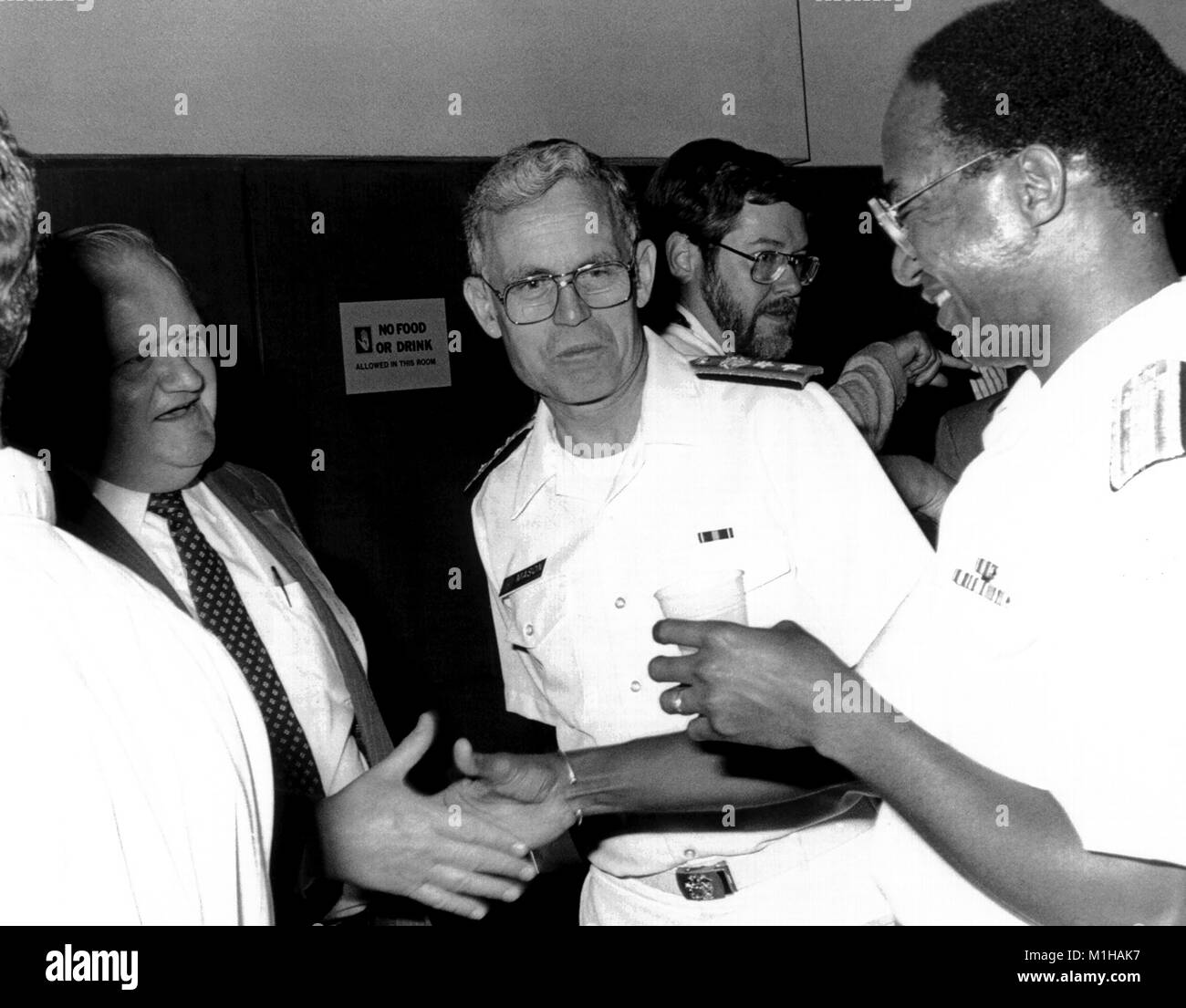 Photograph showing Dr. James O, 1956. Mason and Dr. Donald R. Hopkins ...