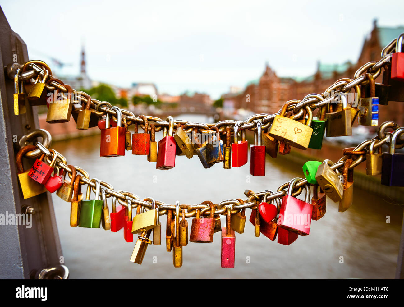 Locks on historical bridge in Hamburg, Germany Stock Photo - Alamy