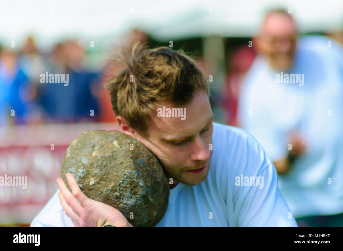Muscular male prepares to throw in the stone put competition at the ...