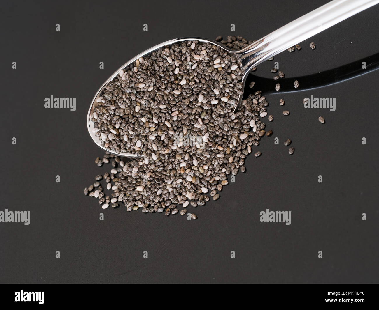 Shiny black seed hi-res stock photography and images - Alamy