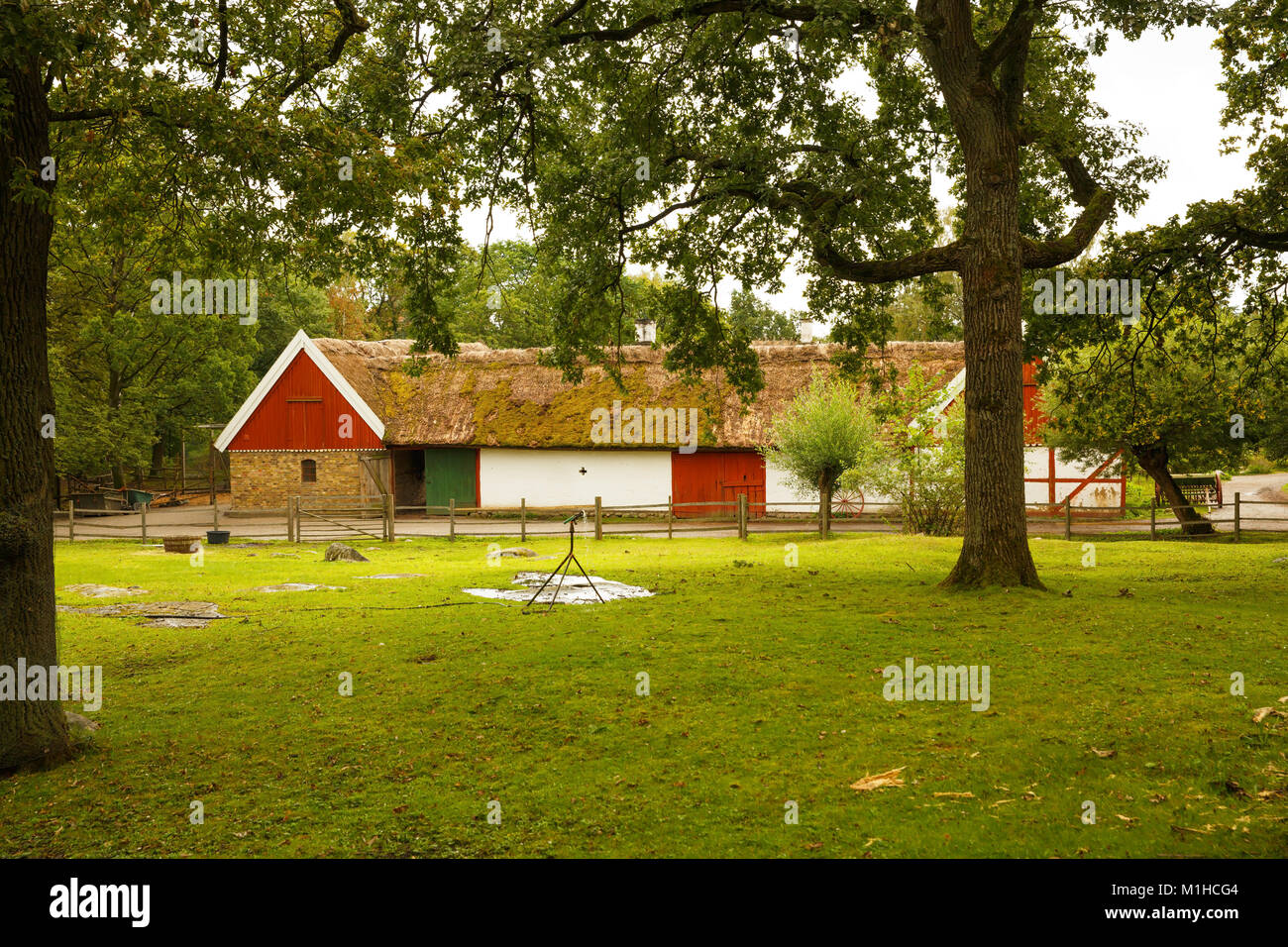 Traditional old farm at Skansen park, the first open-air museum and zoo ...