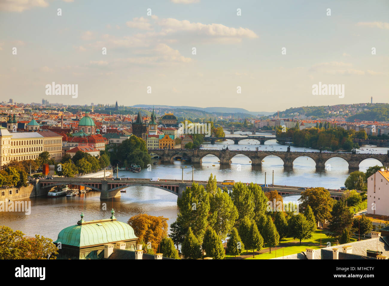 Overview of old Prague with Charles bridge at sunset Stock Photo - Alamy