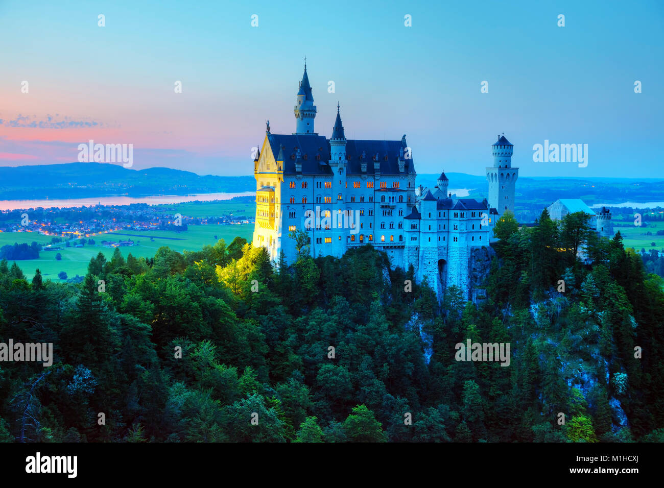 Neuschwanstein castle in Bavaria, Germany at sunset Stock Photo - Alamy