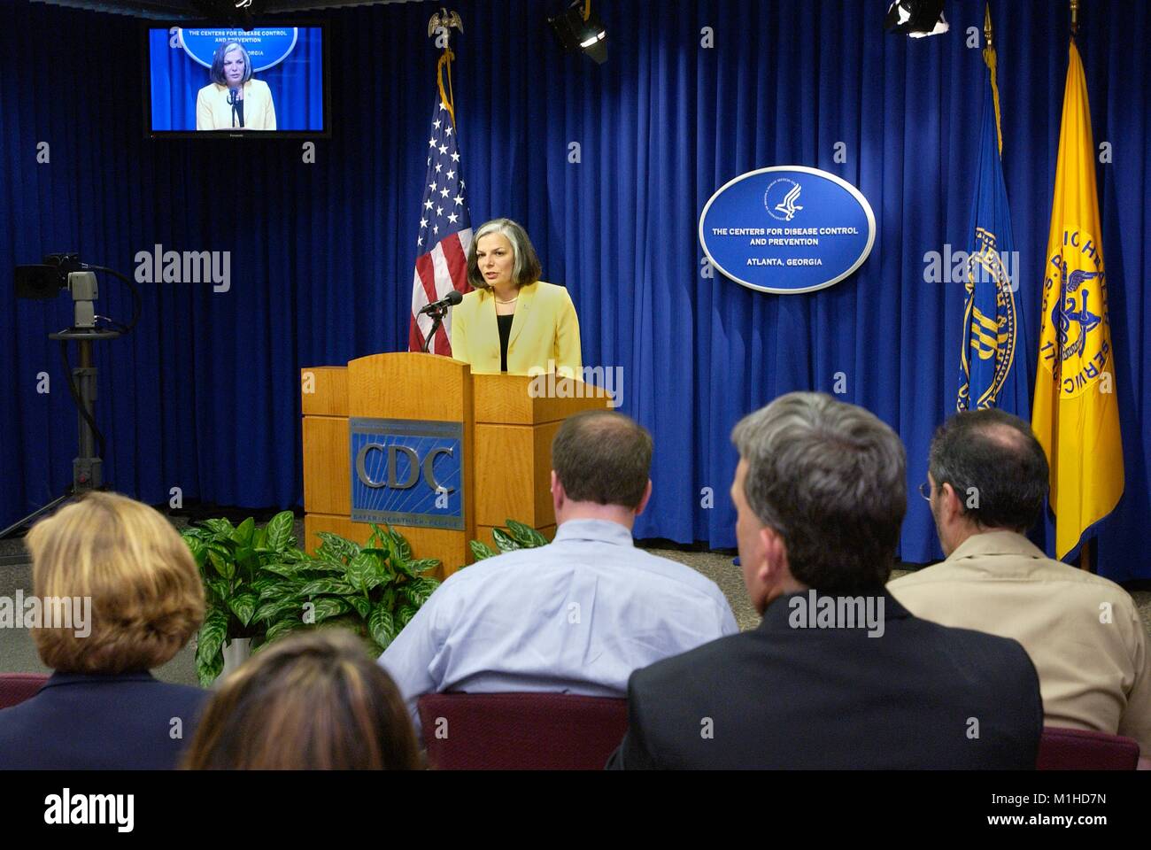 Photograph of Julie Gerberding, former CDC director, speaking in front ...
