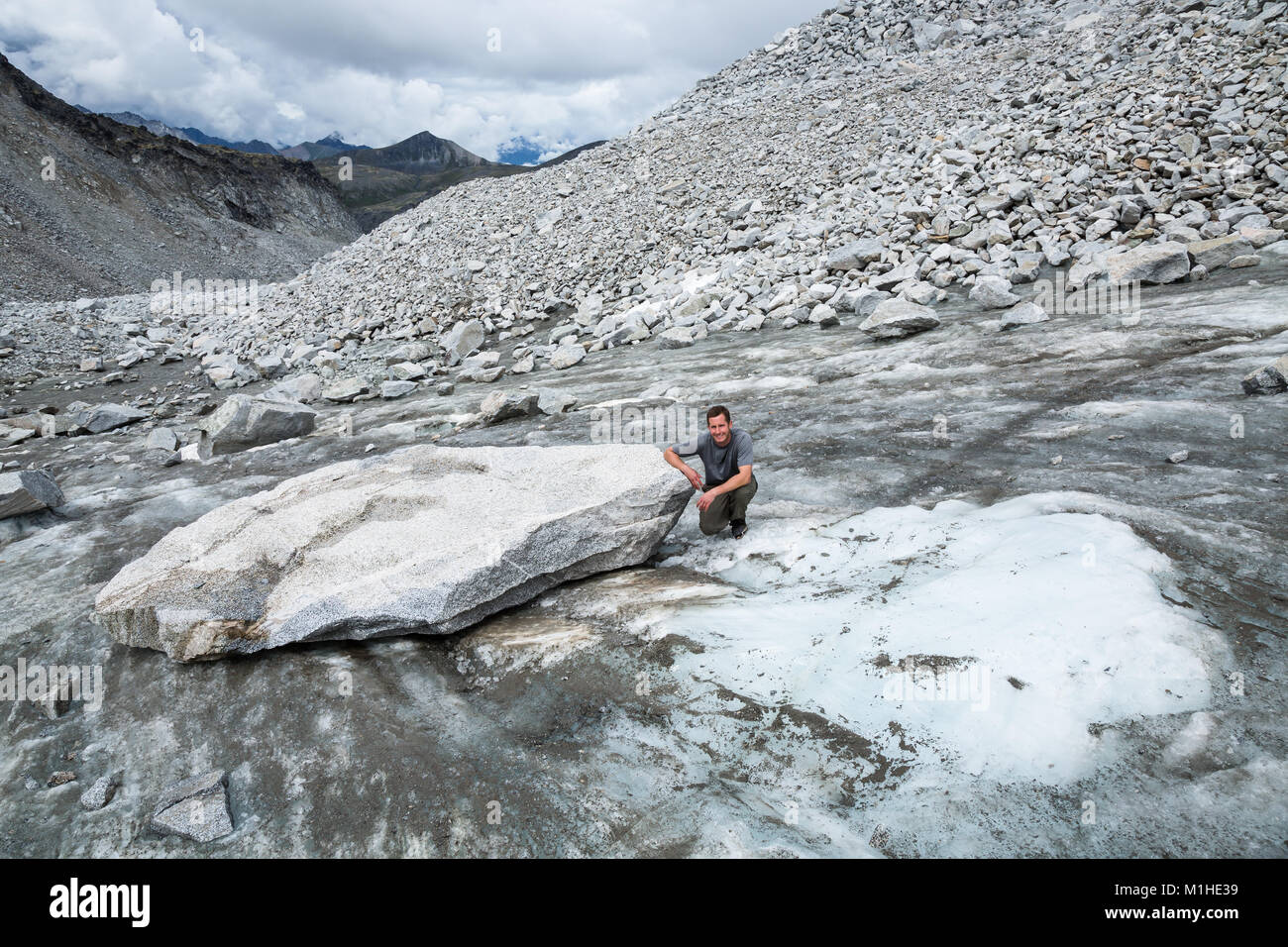 Just moments before this photo, this massive boulder slid from its icy ...