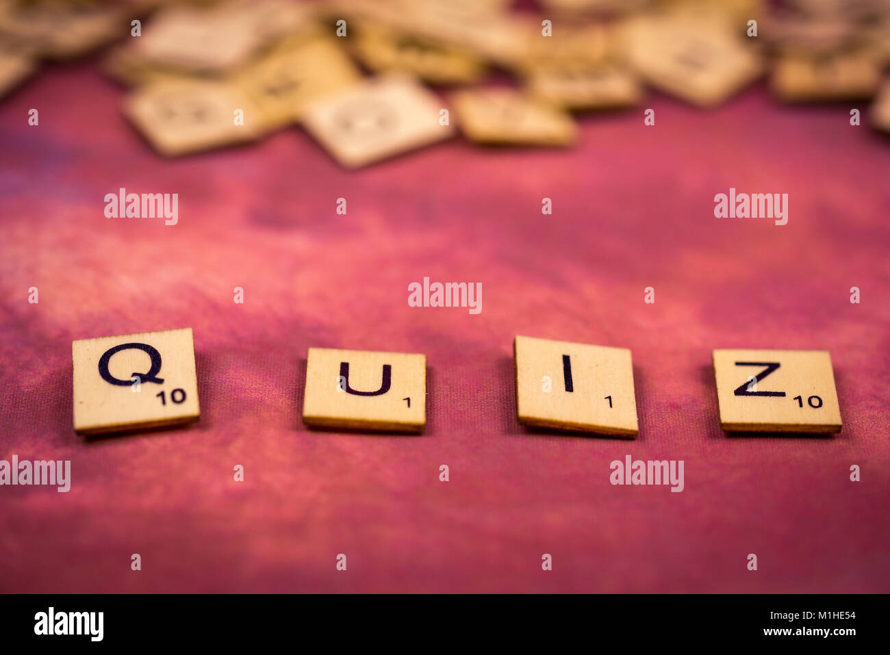 Concept of Alphabet wooden letters with letters forming word : Quiz ...