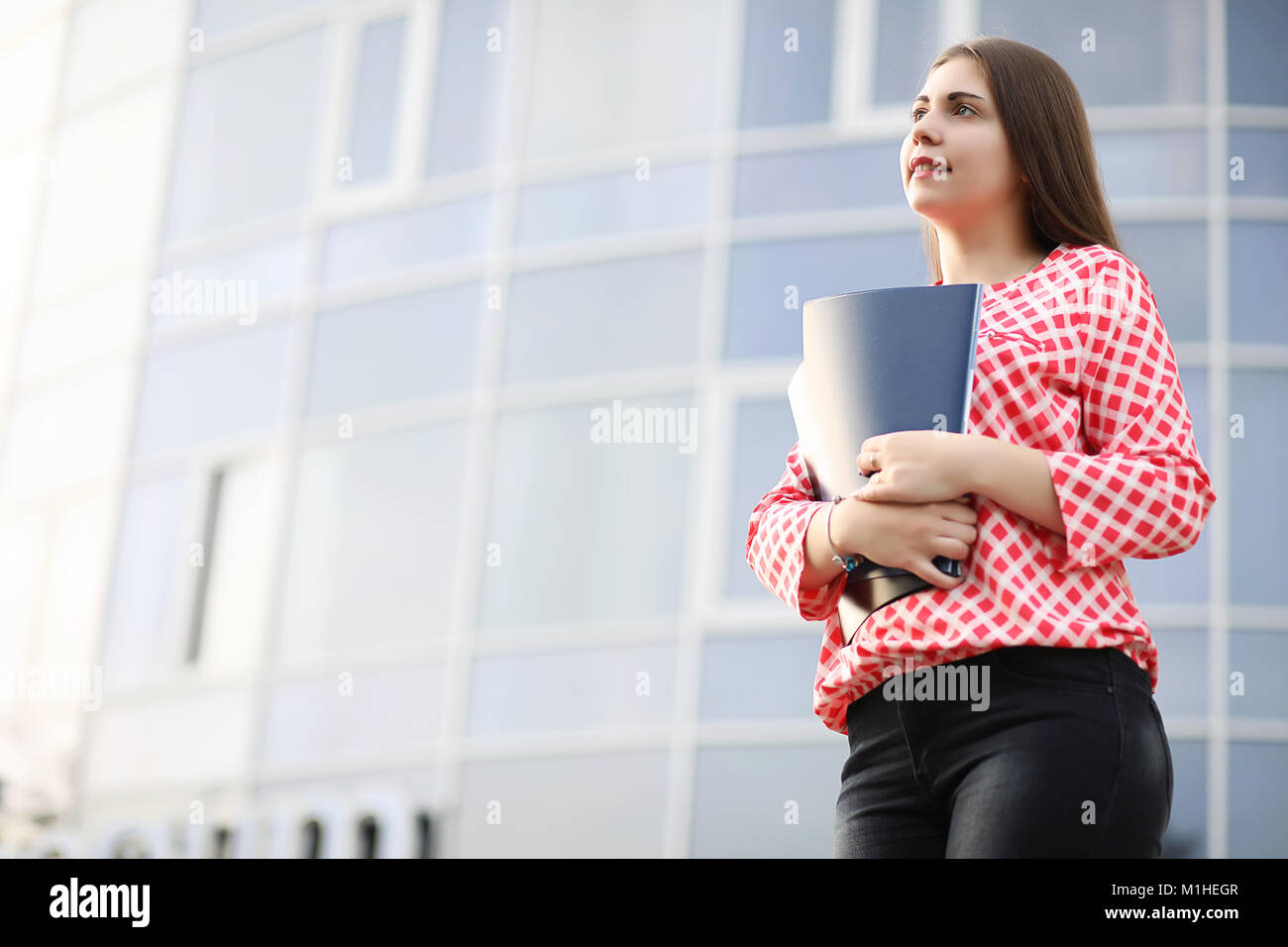 Girl with documents at a business meeting Stock Photo - Alamy