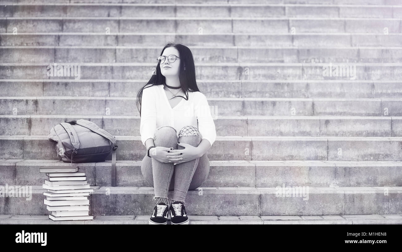 Young girl student on the street Stock Photo - Alamy