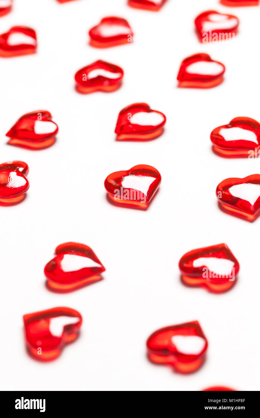 Red love hearts on a plain white background Stock Photo - Alamy