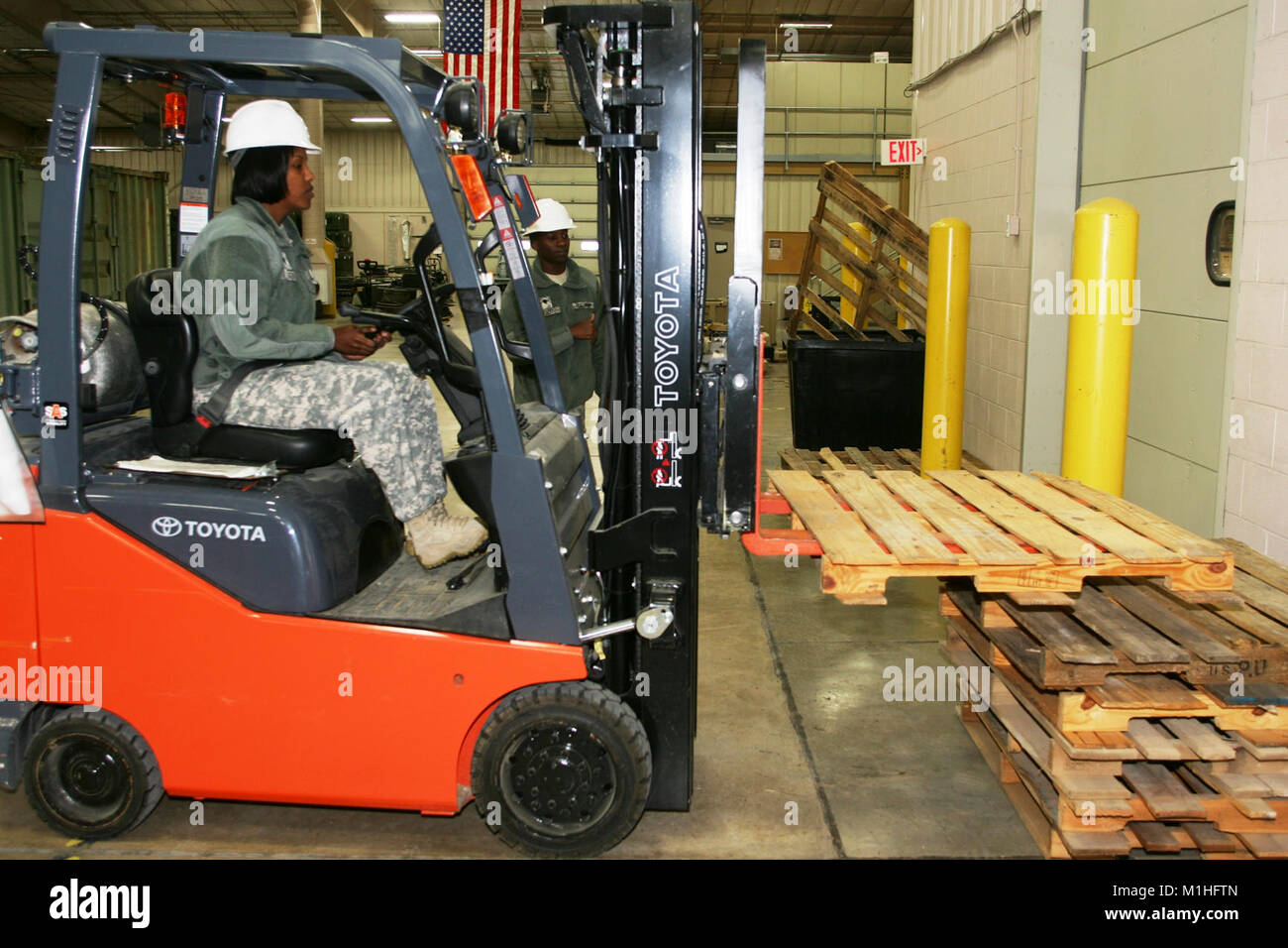 Spc. Arlicia Butler (right), medical logistics specialist with the ...