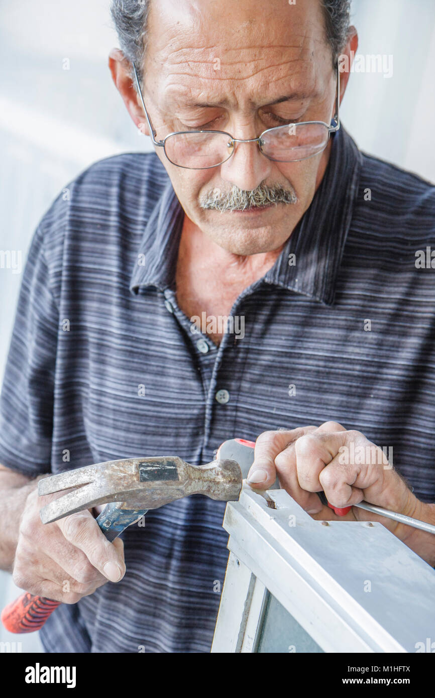 Miami Beach Florida,Hispanic man men male,condominium residential ...