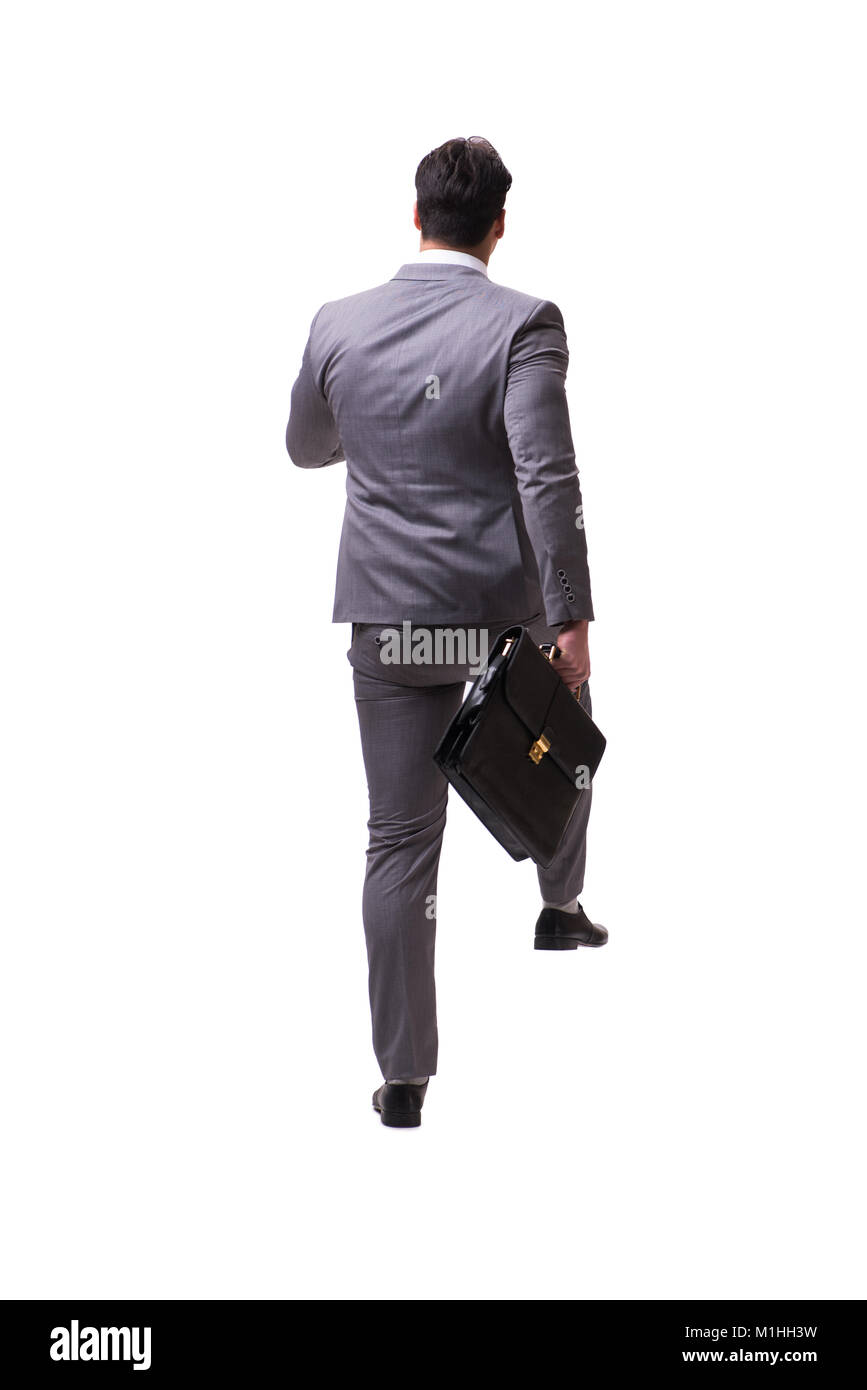 Businessman walking away isolated on white background Stock Photo - Alamy