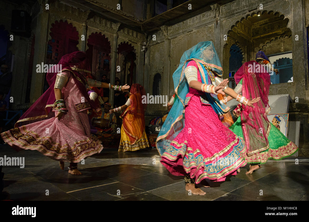 Women performing the traditional veiled Ghoomar dance, Udaipur ...