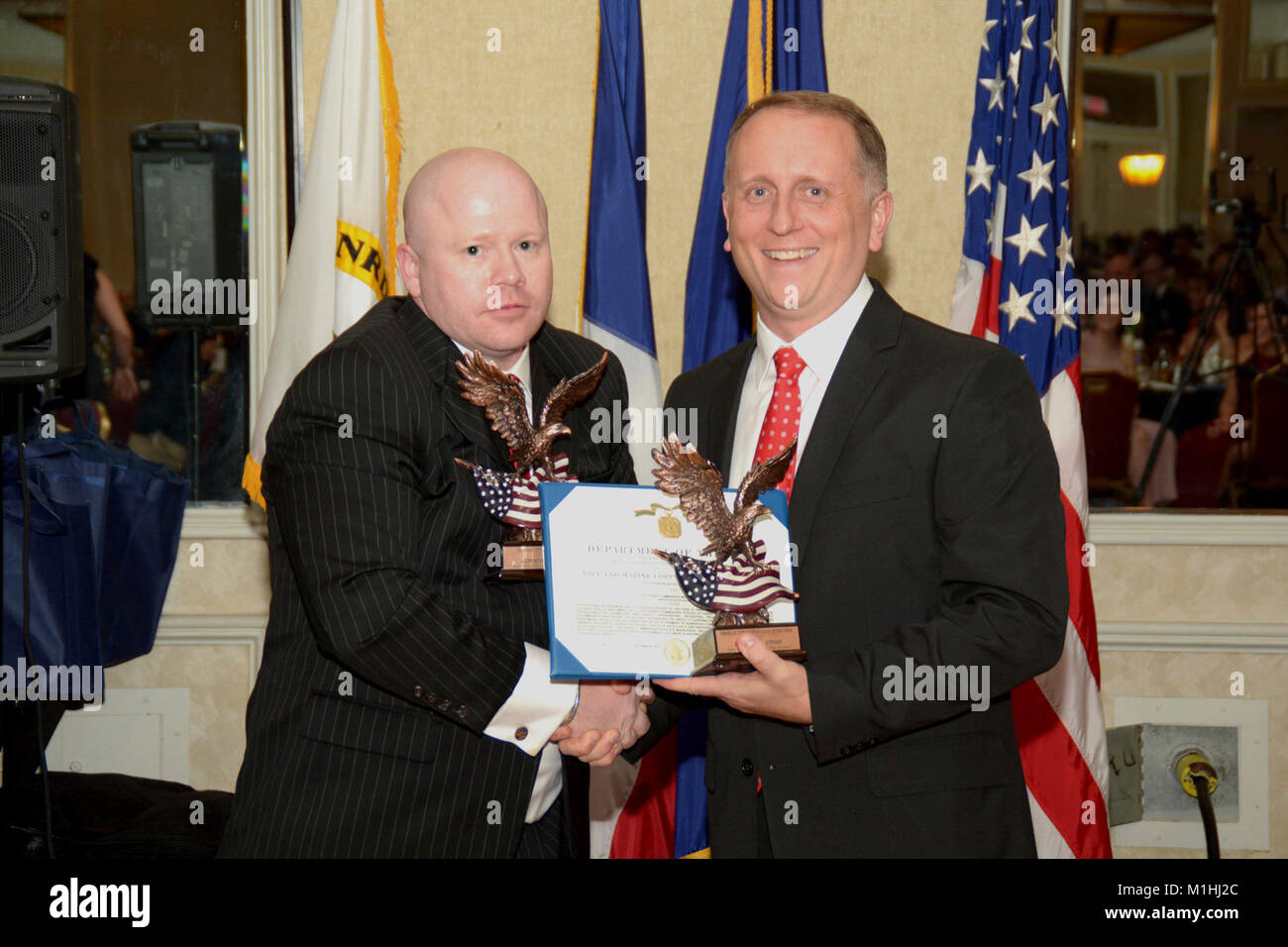 AUSTIN, Texas - (Dec. 19, 2017) Lt. Cmdr. Michael Stroud (left) of Waco ...