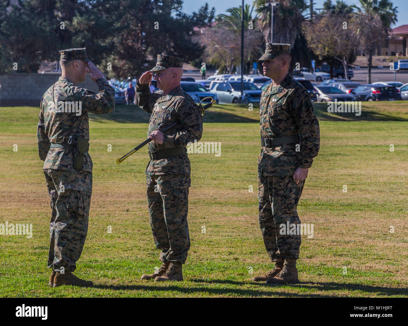 U.S. Marine Sgt. Maj. Jimmy Ferriss (Ret.) salutes Lt. Col. Jeremy ...