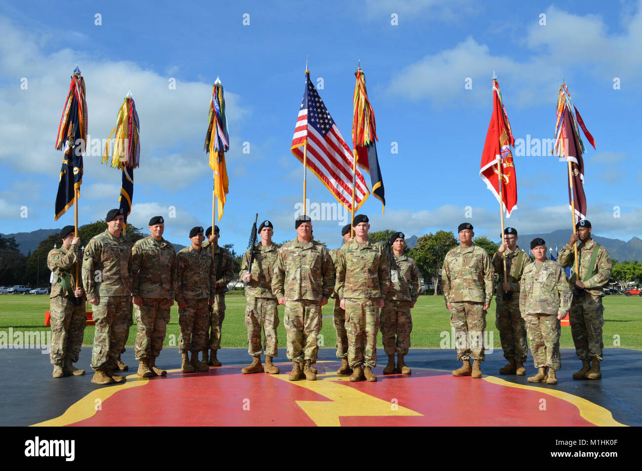 Command Sgt. Maj. Michael J. Spear (center right), incoming senior ...
