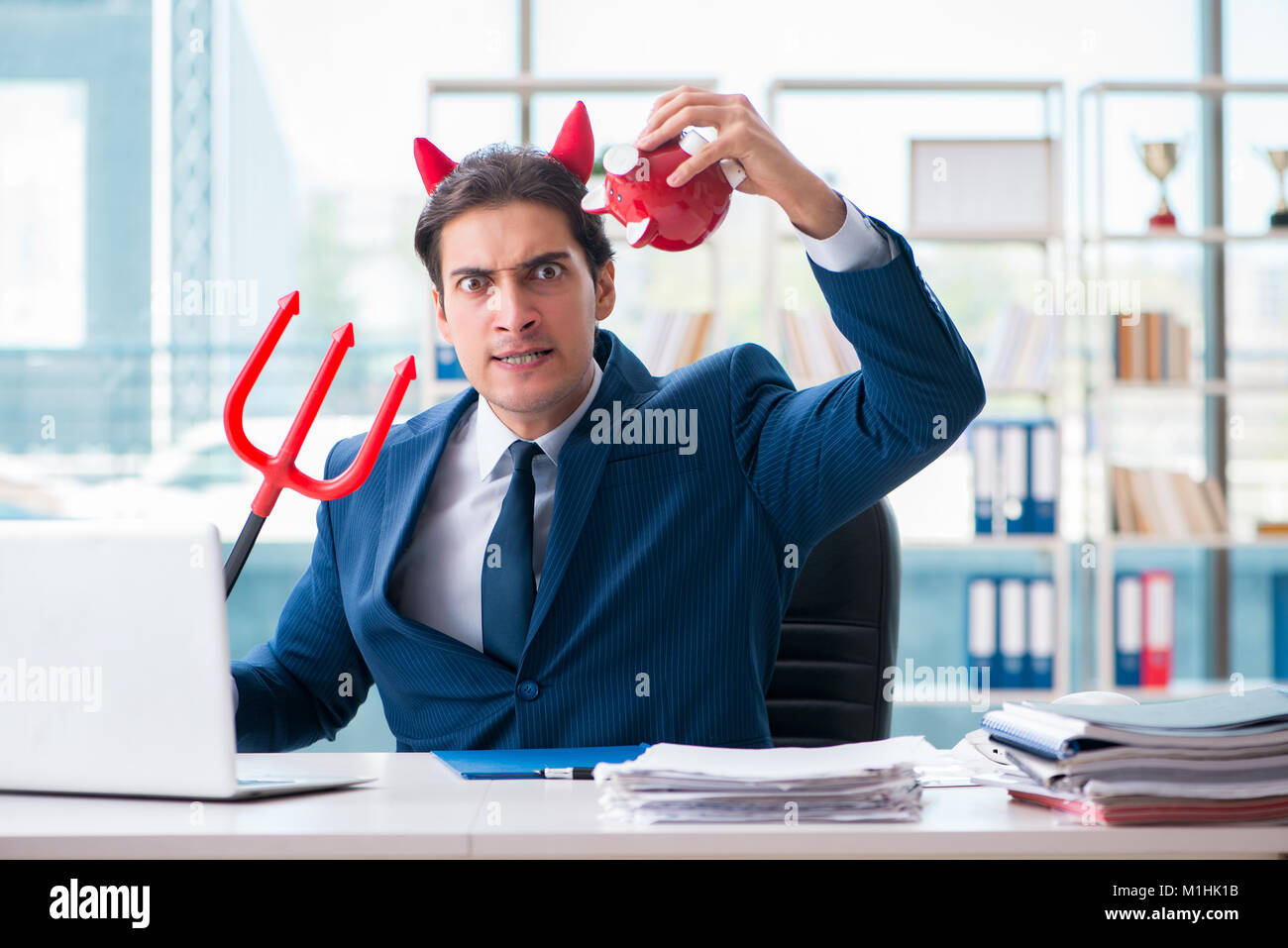 Devil angry businessman in the office Stock Photo - Alamy