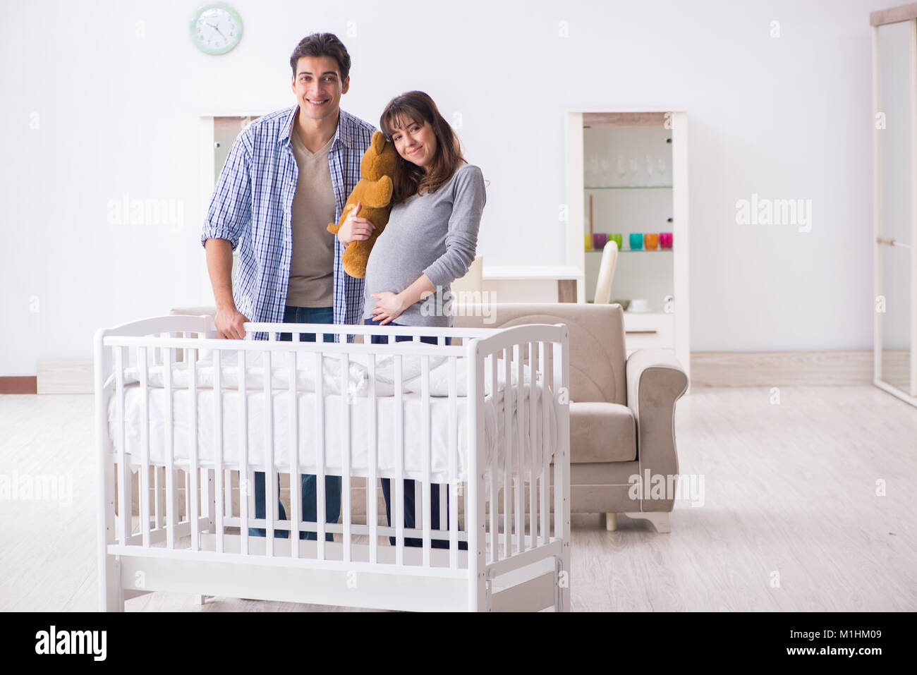 Young parents expecting their first baby Stock Photo - Alamy