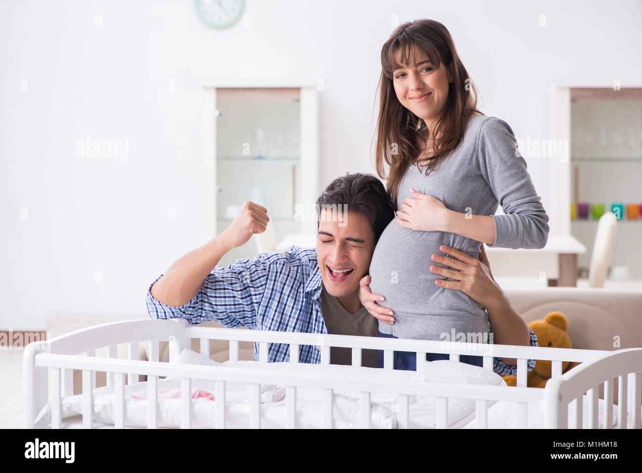 Young parents expecting their first baby Stock Photo - Alamy