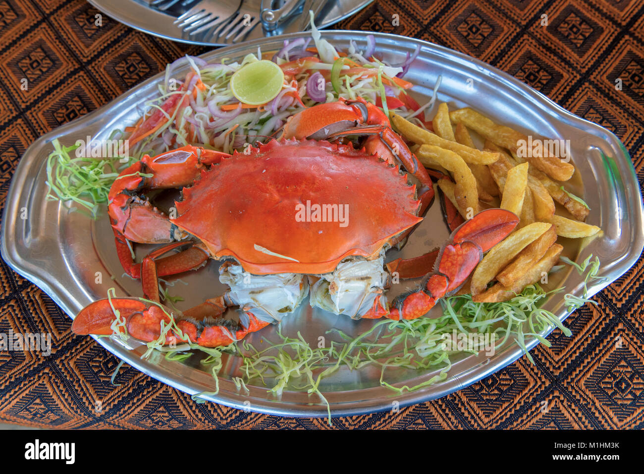 Big crabs and vegetable in beach restaurant, GOA, India Stock Photo - Alamy