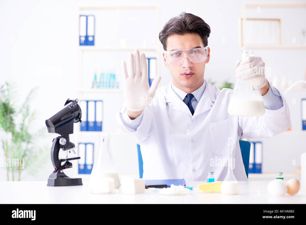 Food scientist testing new stuff in the lab Stock Photo - Alamy