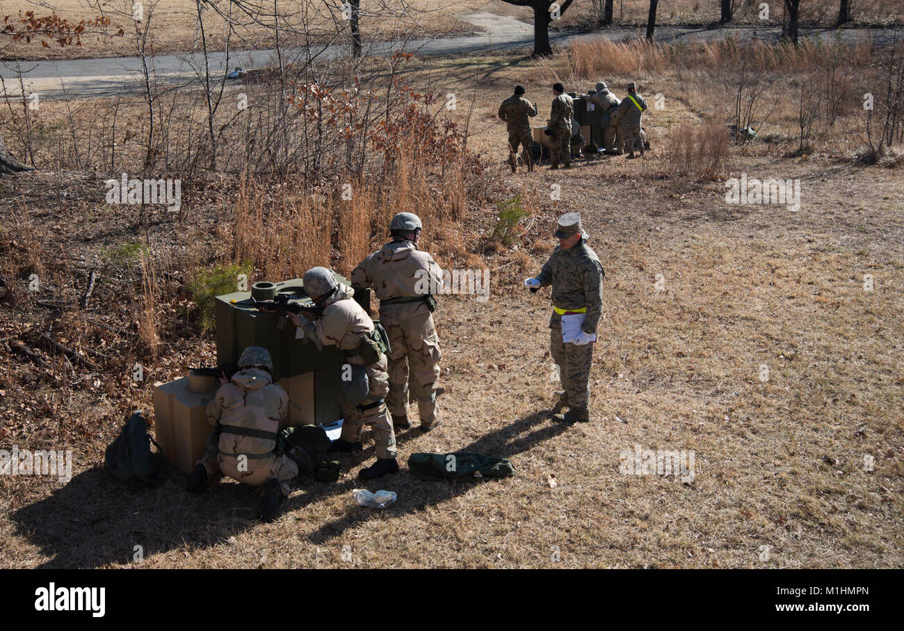 11th Wing Airmen hold defensive fighting positions during the Ability ...
