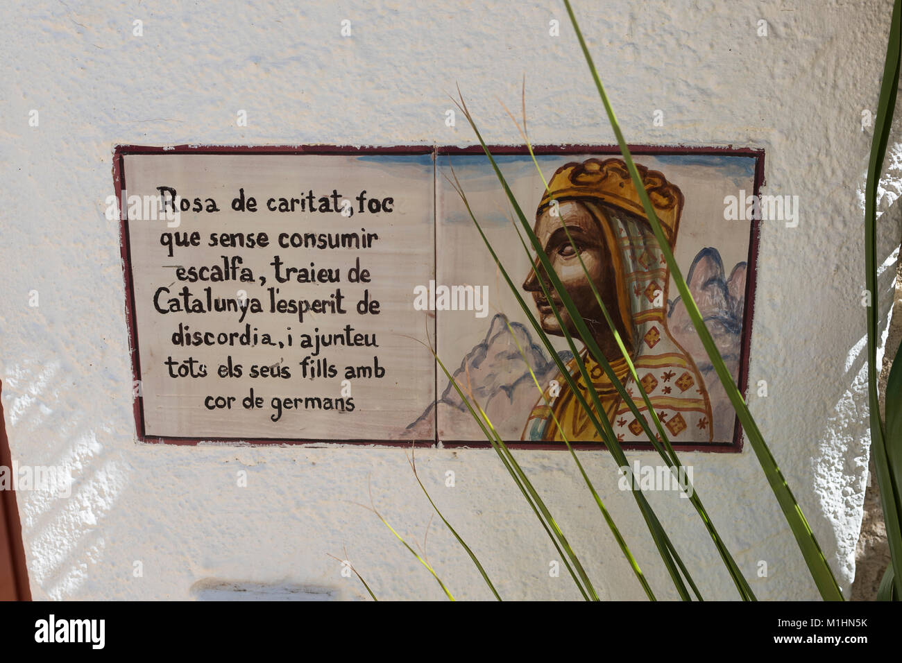Catalan language sign about the "rose of charity" outside a house in ...