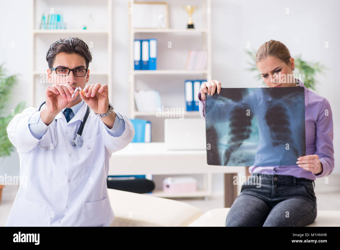 Doctor examining x-ray images of patient Stock Photo - Alamy