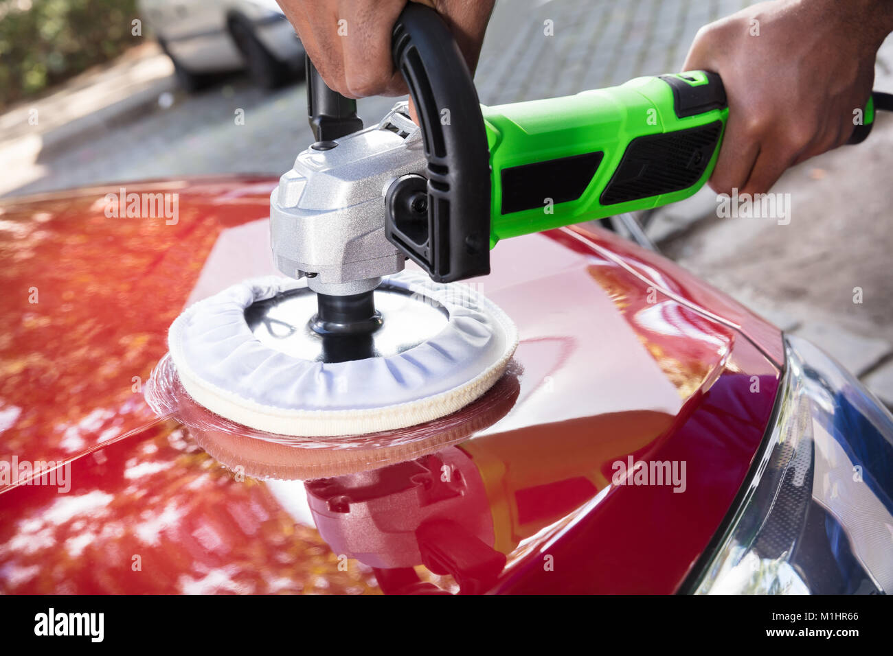 Close-up Of Person Hands Polishing Car With Orbital Polisher Stock ...