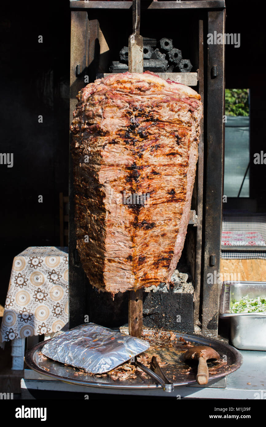 Traditional Turkish Doner Kebab on pole Stock Photo - Alamy