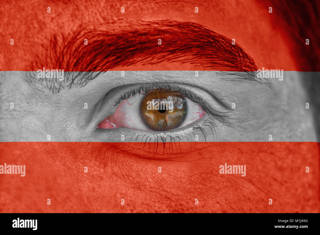 Human face and eye painted with flag of Austria Stock Photo - Alamy
