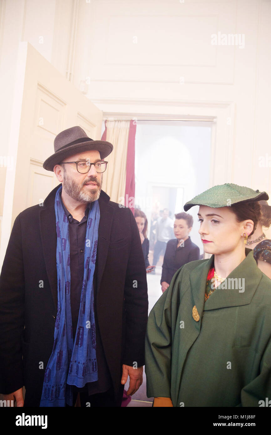 PHANTOM THREAD, costume designer Mark Bridges (left), on set, 2017. ph ...