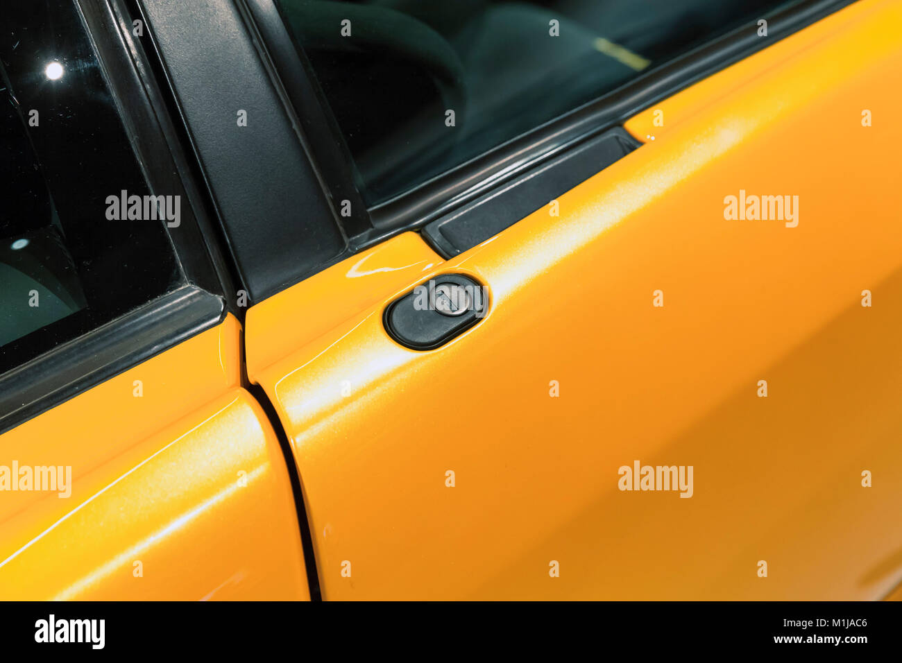 Luxury yellow roadster fragment, door lock. Italian car design Stock ...