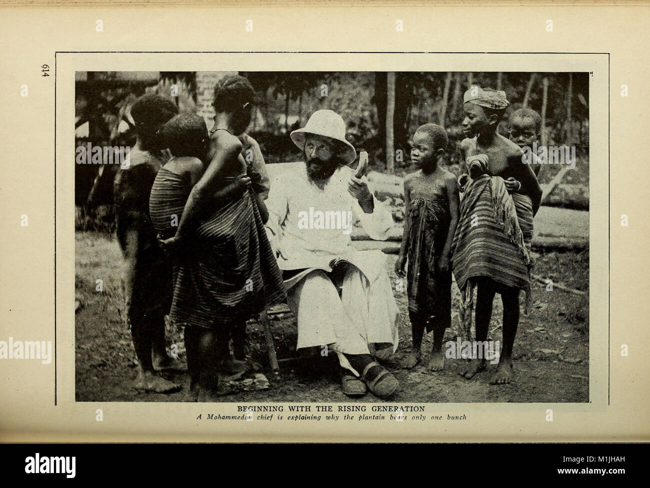 The photograph titled 'African Chief Teaching Native Children' (1915 ...