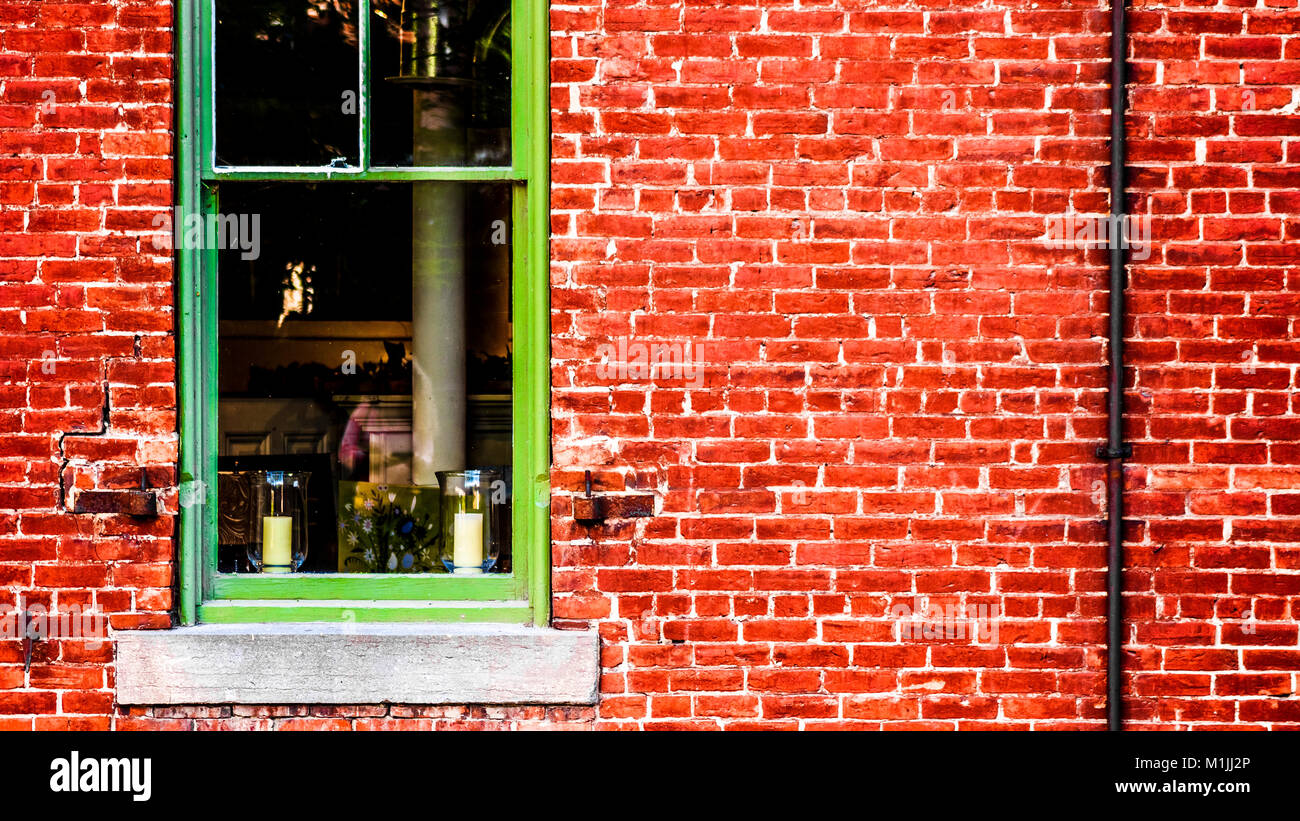 Colonial brick wall with window Stock Photo - Alamy