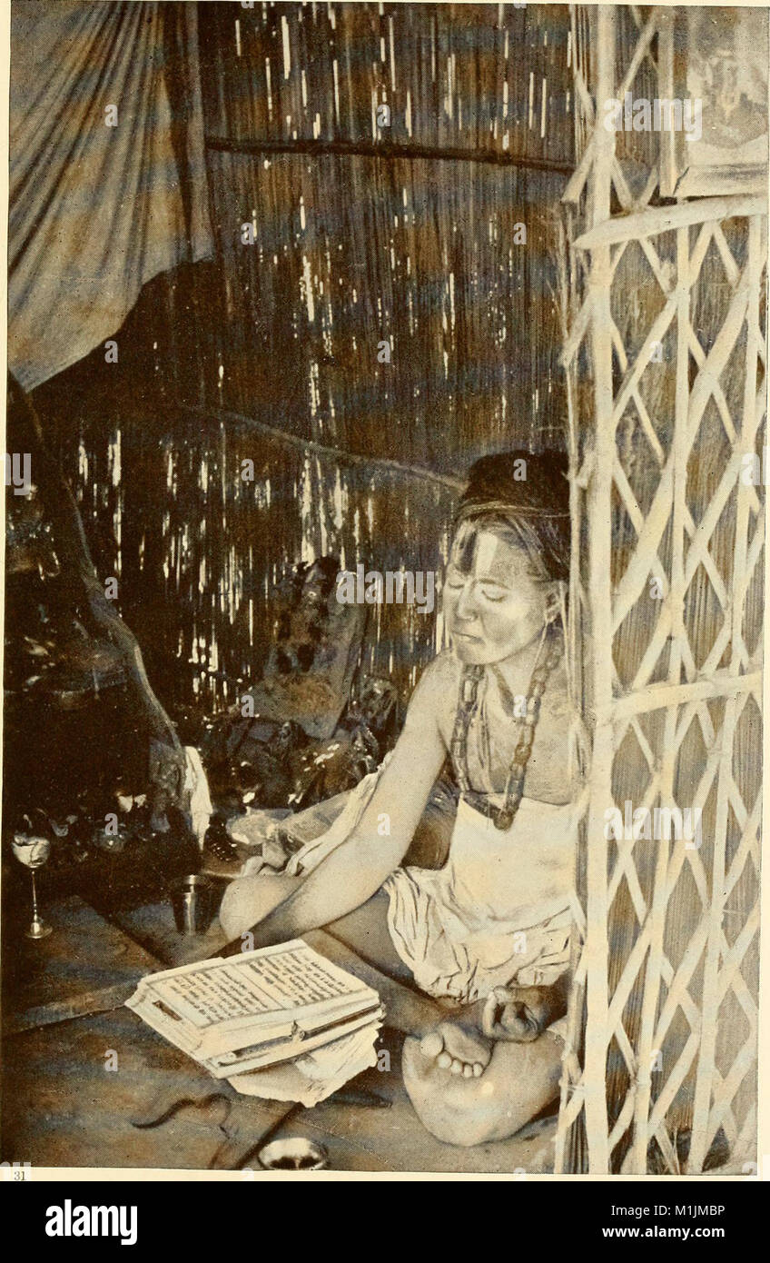 This 1913 image depicts a Vaishnavite nun reading the Ramayana, a key ...