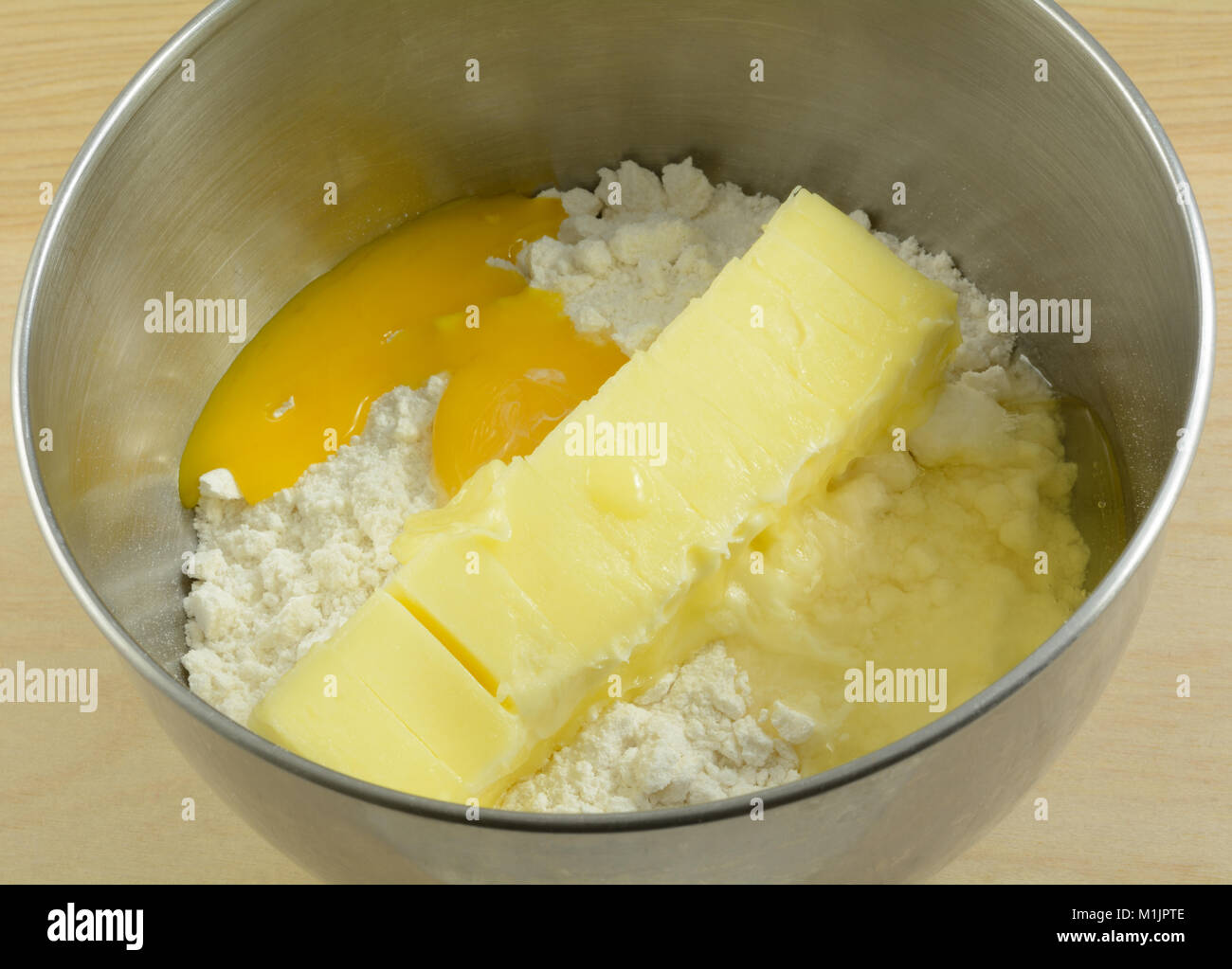Flour in mixing bowl hi-res stock photography and images - Alamy