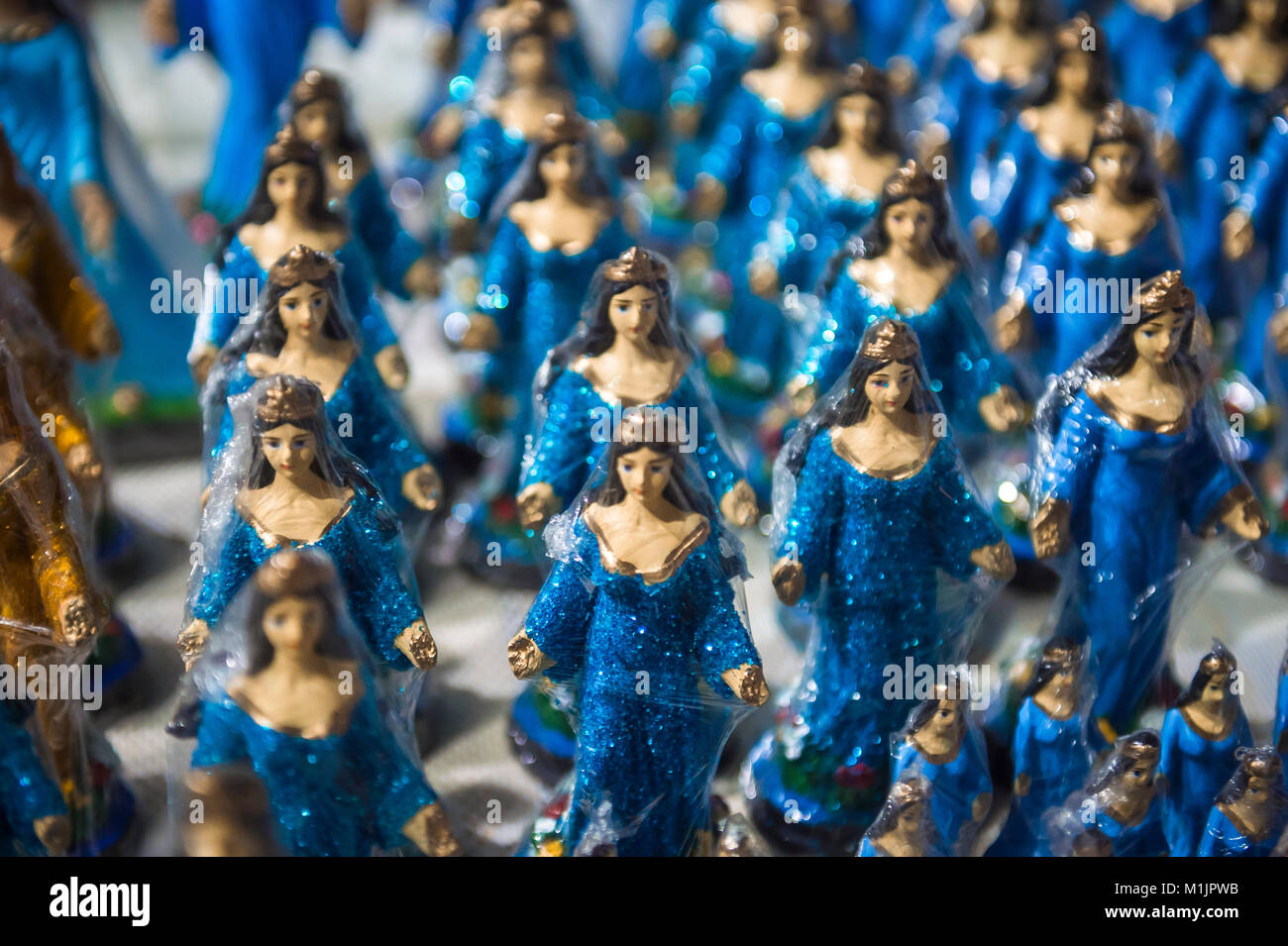 Souvenir figurines of the Yoruba goddess Yemanja stand on display at a ...