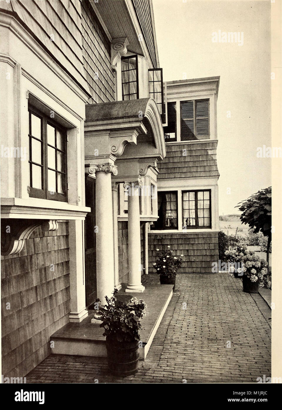 The 1907 publication 'American Homes and Gardens' showcases various ...