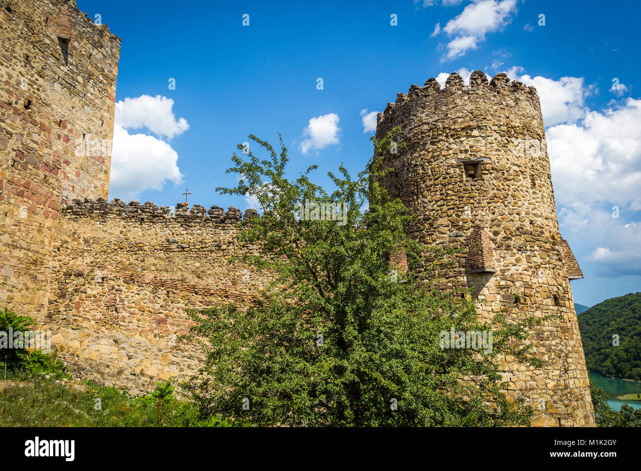 Old ancient stone walls and towers of the fortress Stock Photo - Alamy