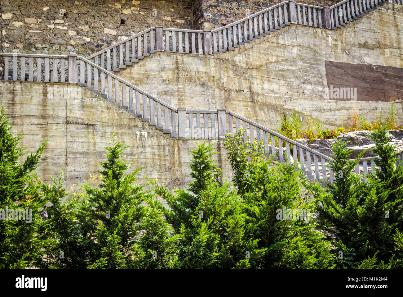A long stone staircase in a stone wall Stock Photo - Alamy