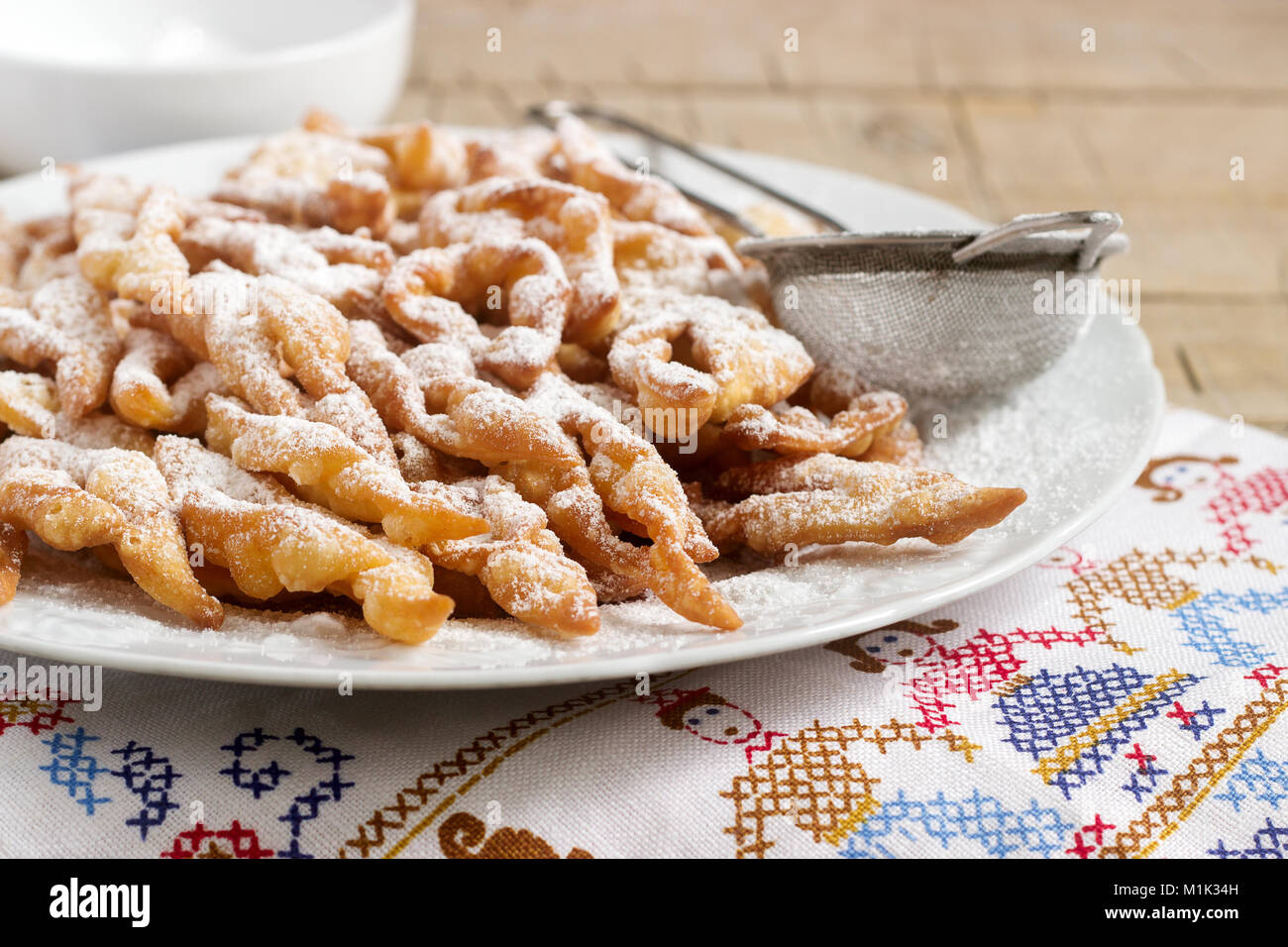 Angel wings biscuits, a traditional European sweet dish for carnival ...